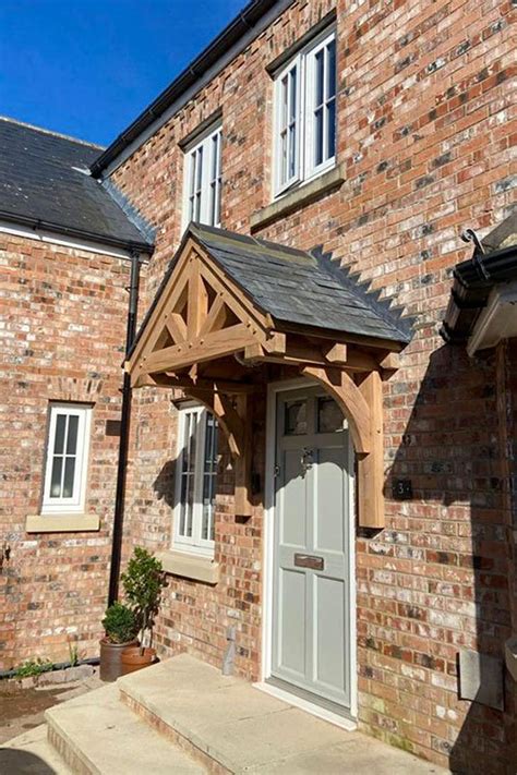 The Fabulous 2 Bracket Oak Canopy Finishes Off The Front Of This Home