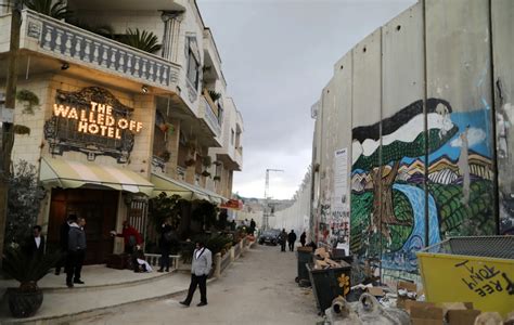 Banksy Opens ‘walled Off Hotel On Separation Barrier In Bethlehem