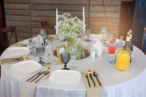 Premium Photo Decorated Service On A Table In A Restaurant At A Banquet