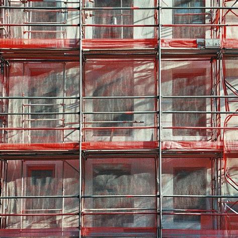 Scaffolding With Safety Netting For Construction Site Protection Scaffolding With Safety Netting For Construction Site Protection