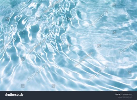 Стоковая фотография 2522625331 Голубая вода с рябью на поверхности Shutterstock