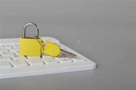 computer keyboard and padlock login and password cybersecurity data