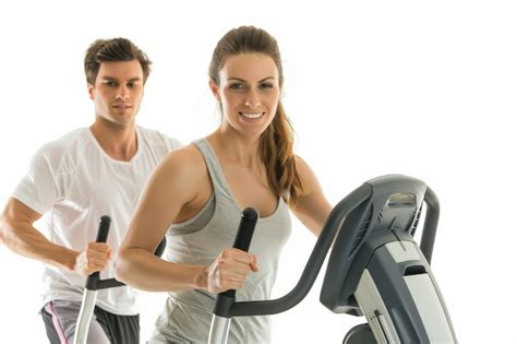 A Couples Energetic Workout On A Modern Elliptical Trainer Premium Ai