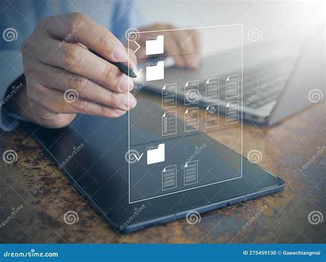 A Businessman Uses Document Management System Dms On Laptop Office Software For Efficient