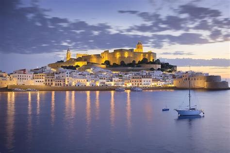 Premium Ai Image View Of Cathedral And Dalt Vila From Harbour At Dusk