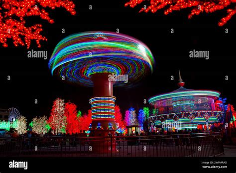 Carnival Amusement Park Ride With Swings Spinning Fair Ride At Night