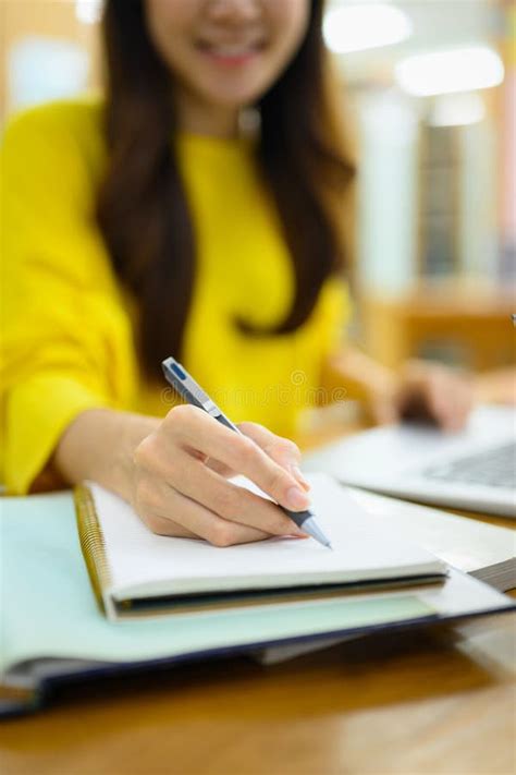 Select Focus On Hand Young Female Student Doing Class Assignment