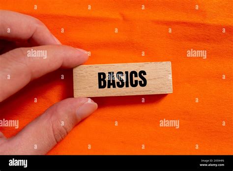 Basics Word Written On Wooden Block With Orange Background Conceptual Basics Word Symbol Copy