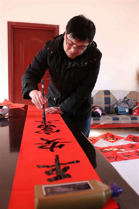 我馆举办迎春送福义写春联活动 文化下乡 满城区文化馆