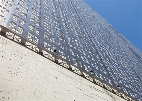 Smart Architectures Lotus Haus Has A Perforated Metal Facade