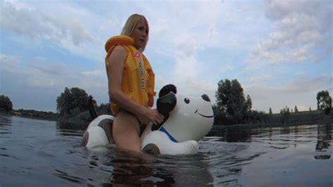 Alla Hotly Fucks A Rare Inflatable Puppy On The Lake And Wears An Inflatable Vest For Safety