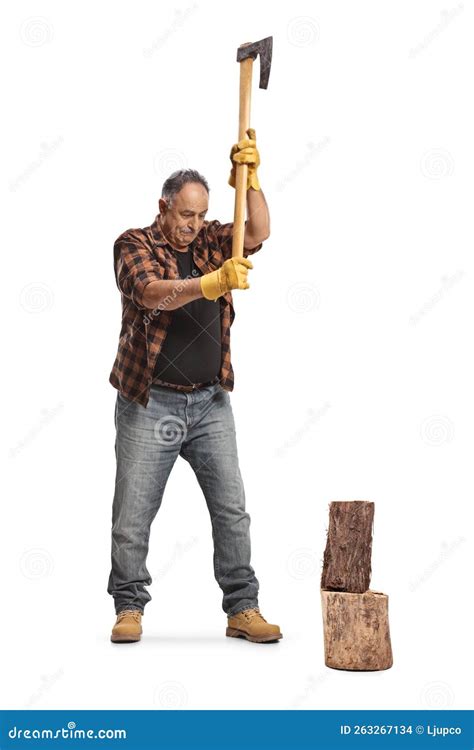 Full Length Shot Of A M Man Cutting A Tree Trunk With An Axe Stock Photo Image Of Active