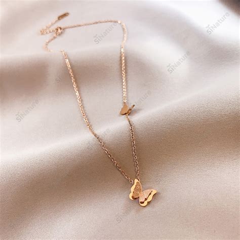 시네이처 🐰ྀི당일발송🐰ྀི 시네이처 로즈골드 더블 나비 목걸이