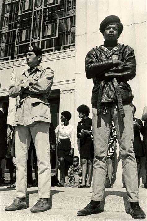 Two Black Panther Men Standing On The Steps Of The Alameda County Court