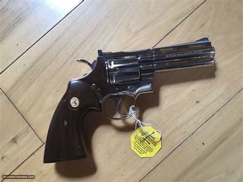 Colt Python 357 Magnum Bright Nickel 4” Barrel New Unfired In The Box With Owners Manual Hang