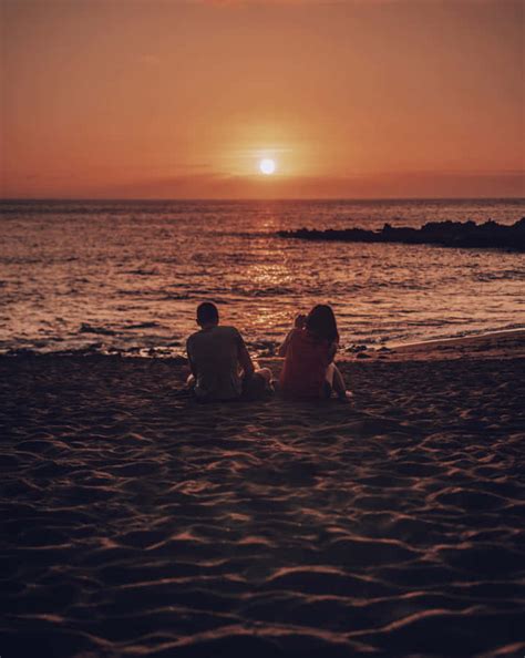 Couple At Beach Sunset Photograph Wallpaper Wallpapersok