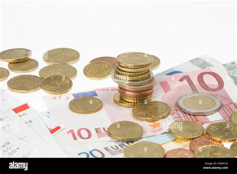 Pass Sheets With European Coins And Bank Notes Isolated On White