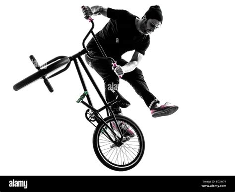 One Man Exercising Bmx Acrobatic Figure In Silhouette Studio Isolated