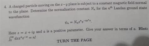 Solved A Charged Particle Moving On The Xy Plane Is Chegg