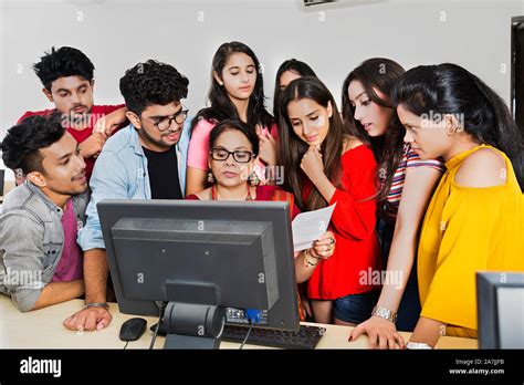 Group College Students With Teacher Studying Computer E Learning