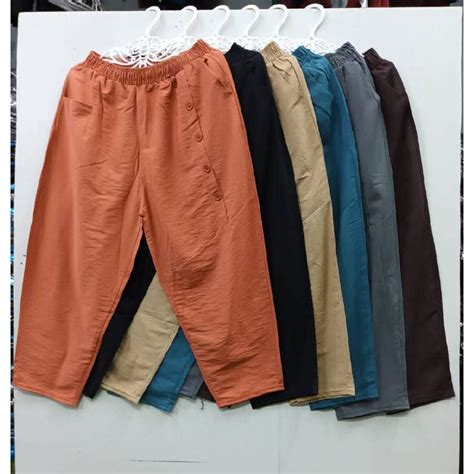 กางเกงผ้านิลินเนื้อผ้านิ่มใส่สบายแต่งกระดุมด้านหน้ามีกระเป๋า 2 ข้าง Naeco Fashion Thaipick