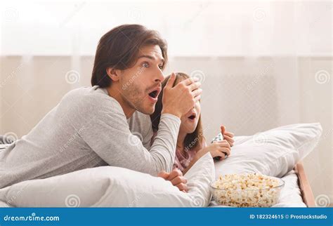 Dad Closing His Daughter Eyes While Watching Movie Stock Image Image