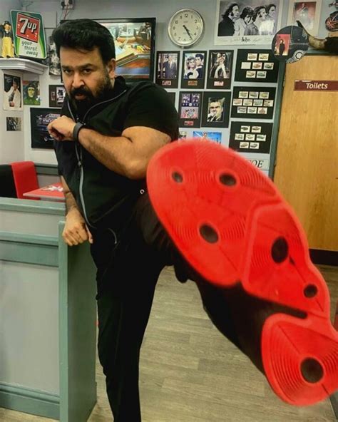 South Indian Stars Ram Charan And Mohanlal Look Dapper In Black Fits