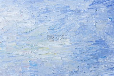 抽象的蓝色油画用画笔在画布上描绘冬天的背景