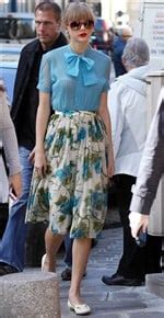 Taylor Swift Traipses Around Showing Her Bra