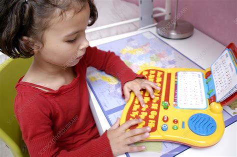 Girl Playing Stock Image P930 0623 Science Photo Library