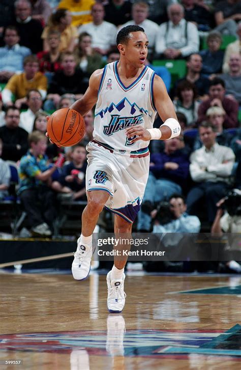 Guard John Starks Of The Utah Jazz Dribbles The Ball During The Nba