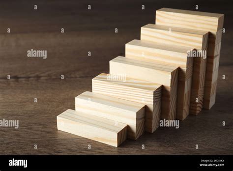 Steps Made With Blocks On Wooden Table Career Ladder Stock Photo Alamy