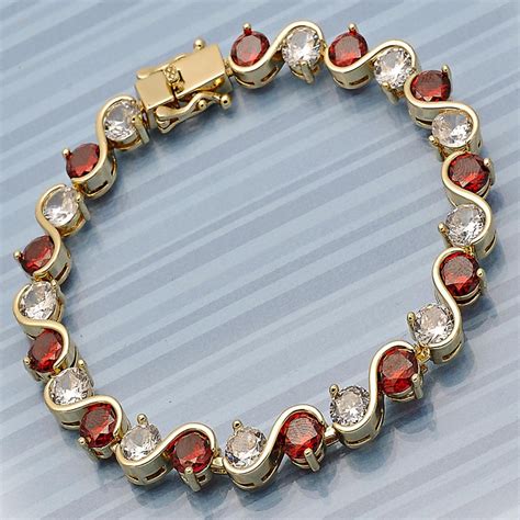 Oro Laminado Tennis Bracelet Gold Filled Style With Garnet And White