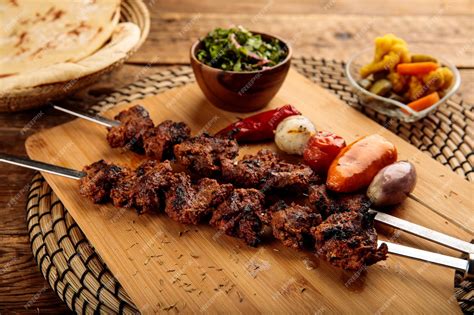 Premium Photo Shish Kebab Or Beef Seekh Boti Served In A Wooden