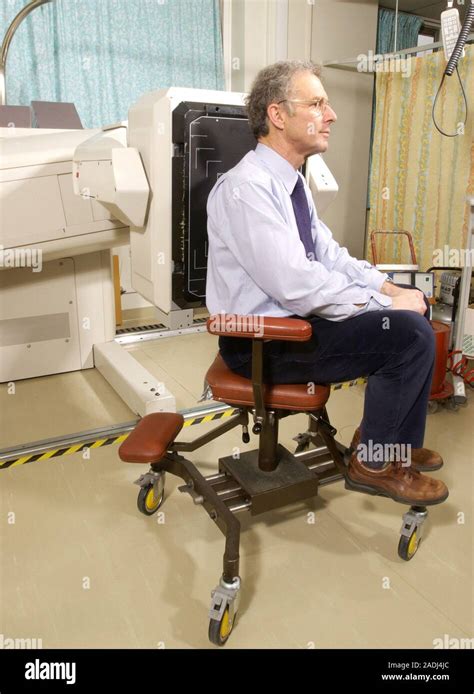 MODEL RELEASED Gamma Camera Scanning Patient Undergoing A Gamma Or Radionuclide Scan This