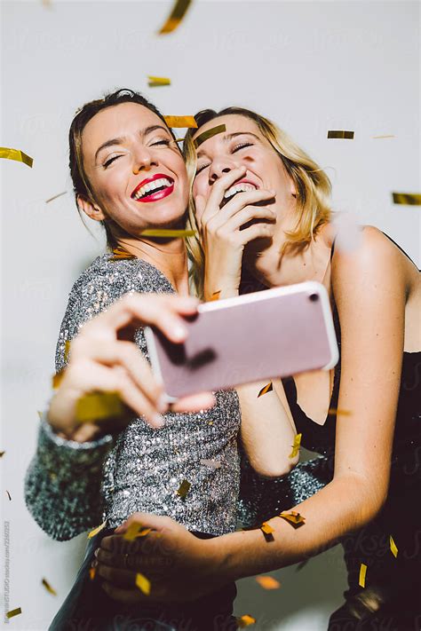 Beautiful Laughing Women Taking A Selfie In A New Year Party