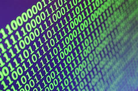 Premium Photo Macro Shot Of Binary Code On The Monitor Of An Office Computer