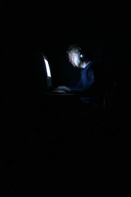 Premium Photo Double Exposure Of Man Working On Computer In Dark