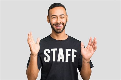 Premium Photo Receiving A Pleasant Surprise Excited And Raising Hands