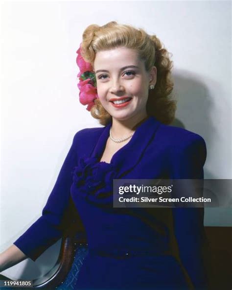 Gloria Dehaven Us Actress Wearing A Blue Dress With Pink Flowers