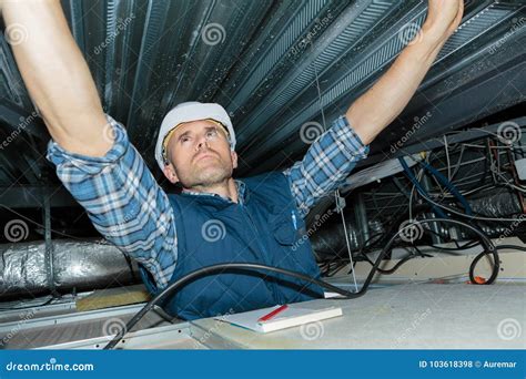 Man Repairing Electrical Wiring On Ceiling Stock Photo Image Of Chipboard Adult 103618398