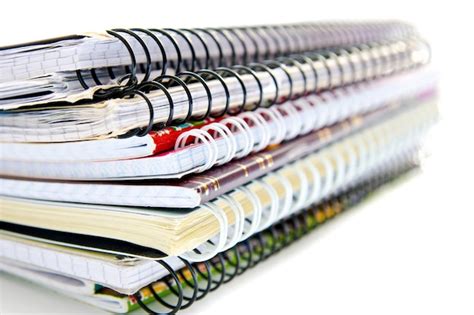 Premium Photo Stack Of Notebooks