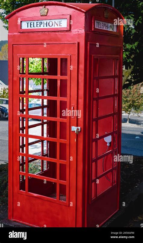 Classic British Red Phone Booth On A City Street Traditional Red