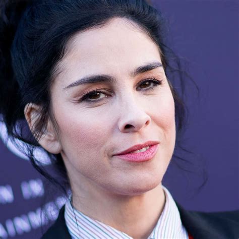 Download Charming Sarah Silverman Smiling At An Event Wallpaper