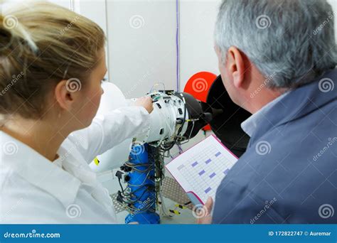Woman And Man Engineers Testing Circuit Board Stock Image Image Of Board Technology