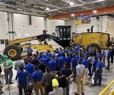 Caterpillar Celebrates Production Of 1000th Cat® 24 Motor Grader Cat