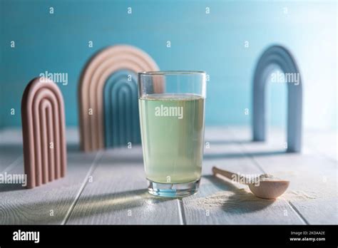 Psyllium Husk And Glass Of Water On Blue Wooden Background Superfood