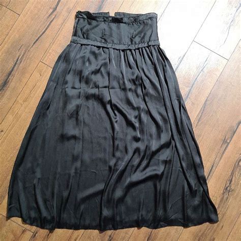 کمدا قیمت و خرید دامن مشکی برند نمیدونم سایز خودش زده 44 رنگ مشکی