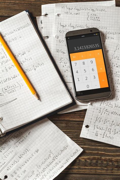 Mathematical Equations Written In A Notebook Calculator App Stock
