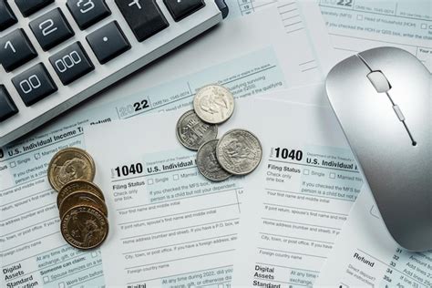 Premium Photo Income Tax Form 1040 With Dollar Coin Calculator Od